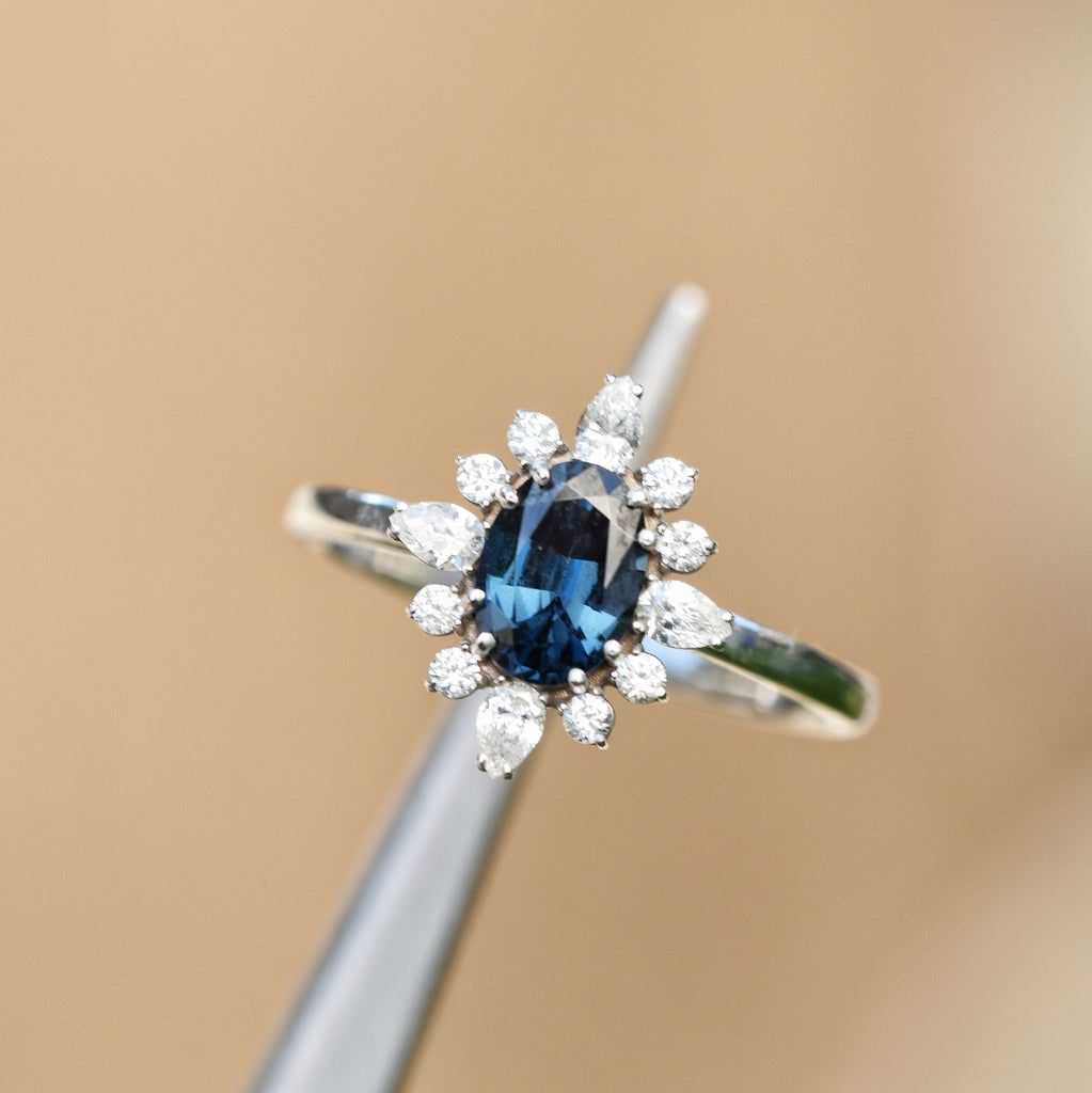 Stunning Oval Deep Blue Spinel Ring in Special Halo Setting | MOGGA ...